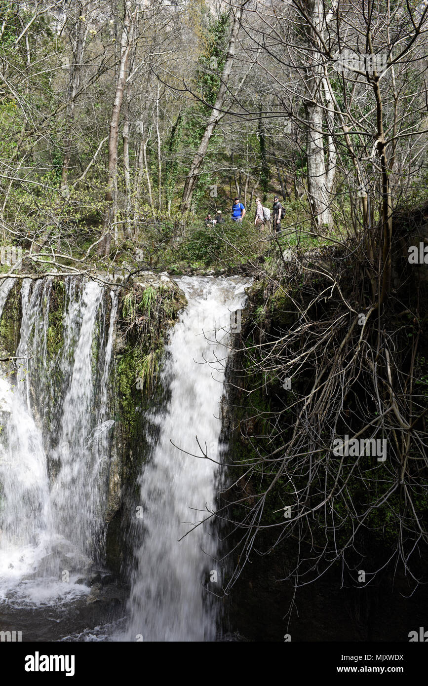 A waterfall and stream in the Valle delle Ferriere Nature Reserve near ...