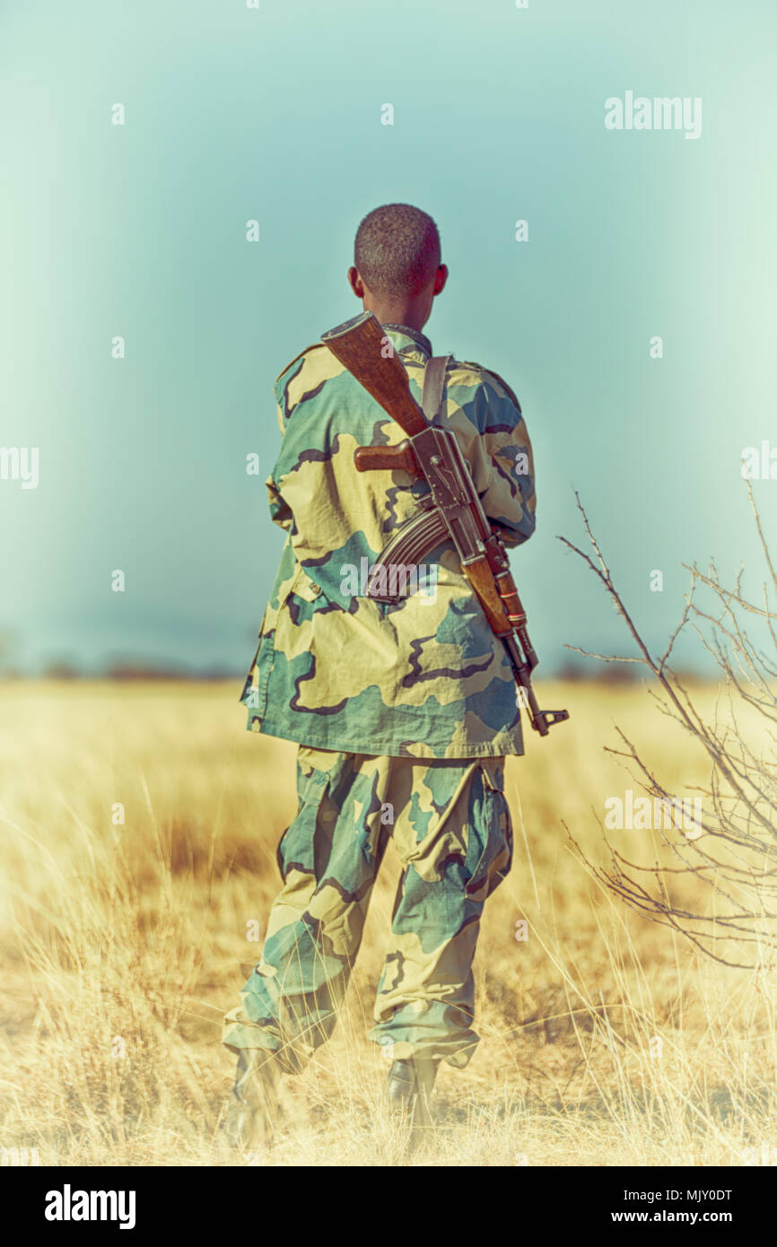 africa in the land of ethiopia a black soldier and his gun looking the ...