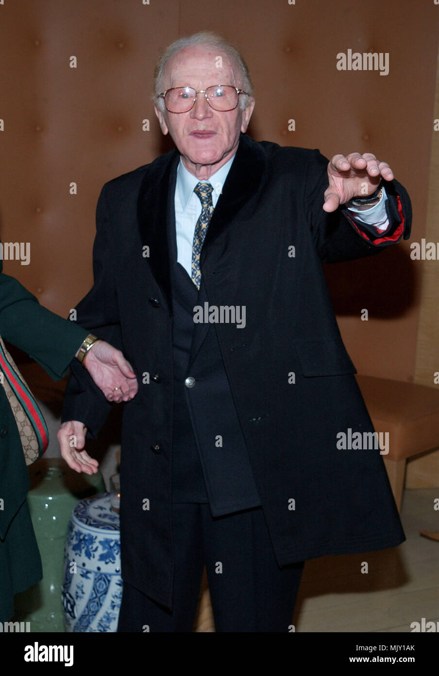 Red Button arriving at the engagement party for Liza Minelli and David ...
