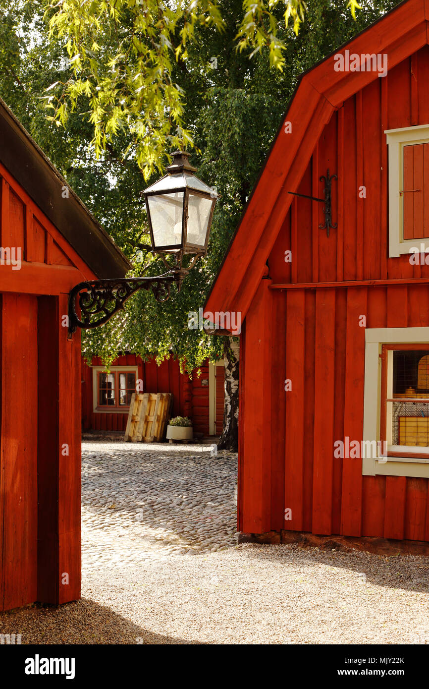 Old red wooden 1700th century smithy buildings in Eskilstuna, Sweden ...