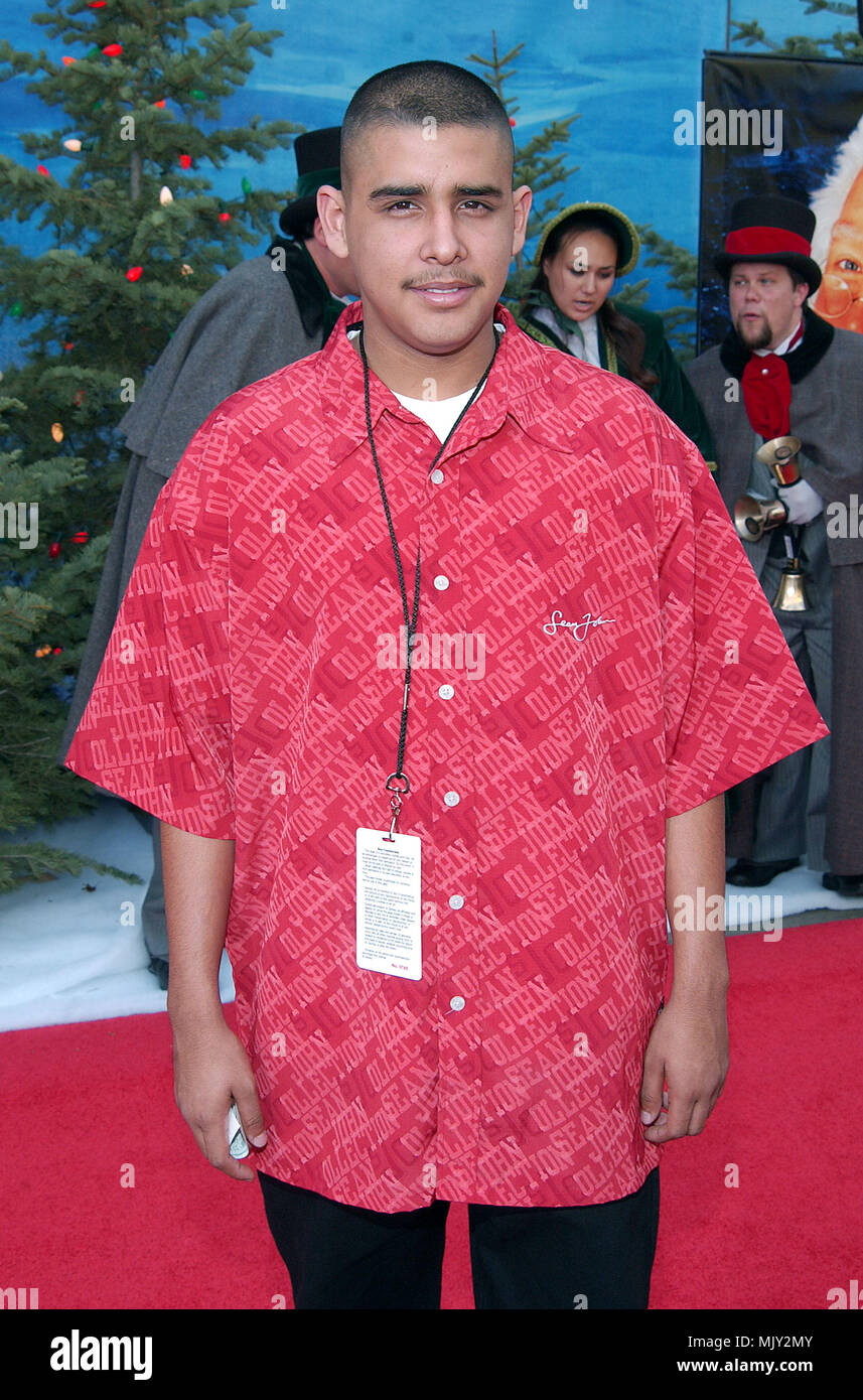 Miguel Castro arriving at the Santa Clause 2 premiere at the El Captain ...