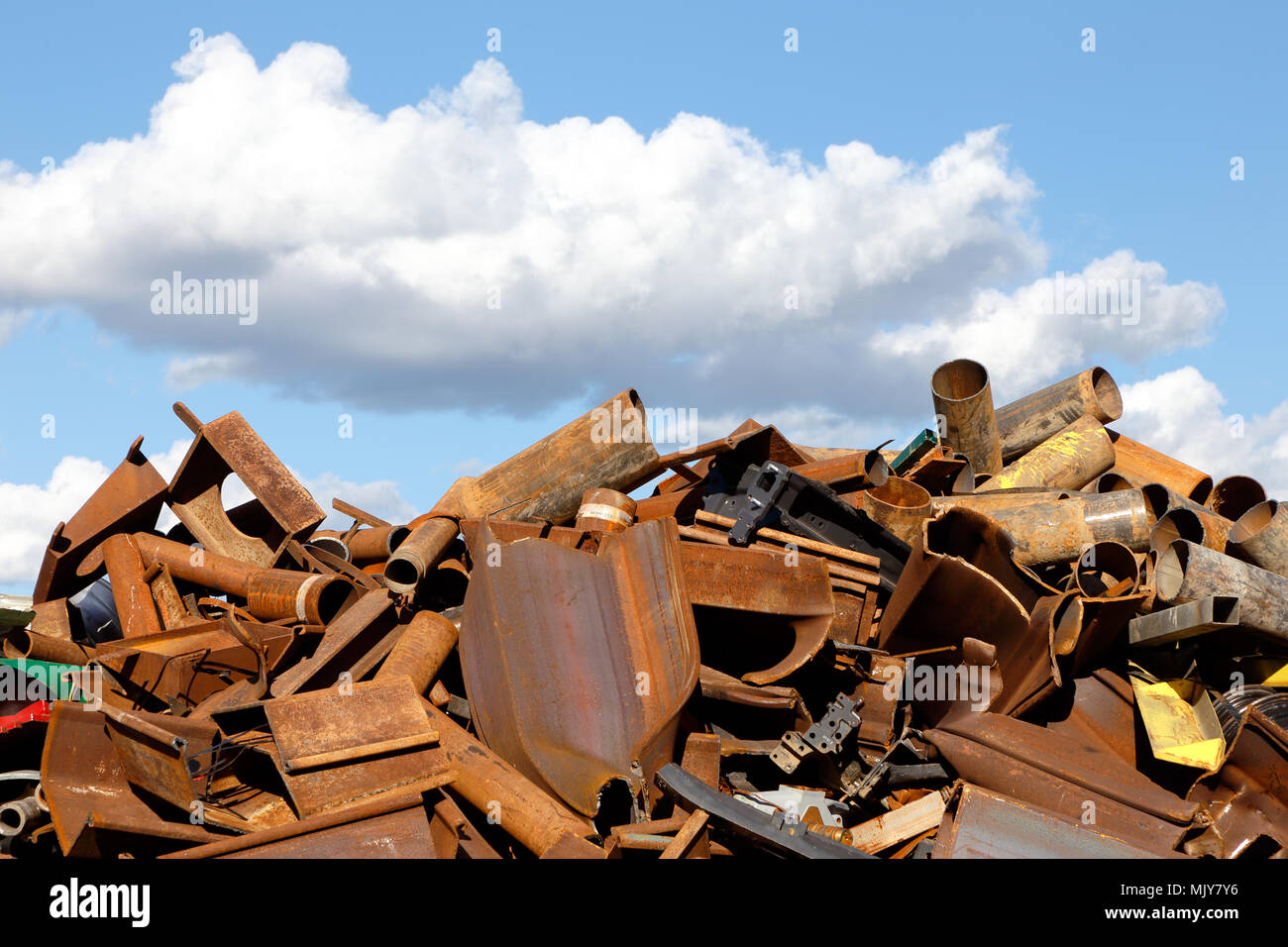 A heap of rusty scrap metal for recycling Stock Photo - Alamy