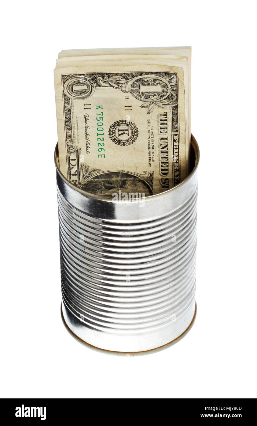 US dollar bills inside an opened tin can isolated on white background ...