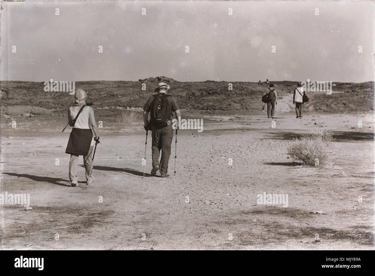 in danakil ethiopia africa the old backpacker people walking in the ...