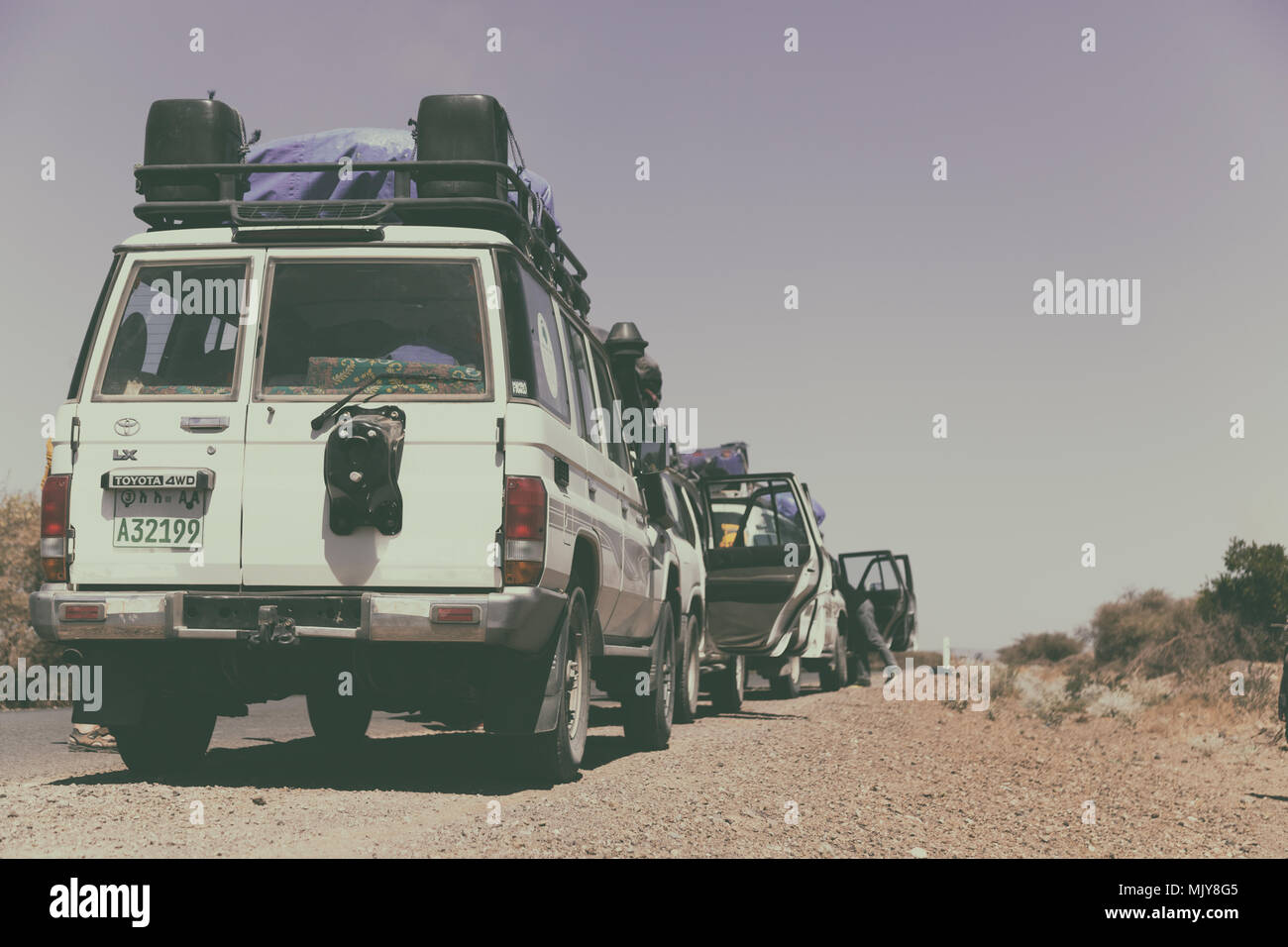 ETHIOPIA,DANAKIL-CIRCA JANUARY 2018--unidentified people and car in the ...