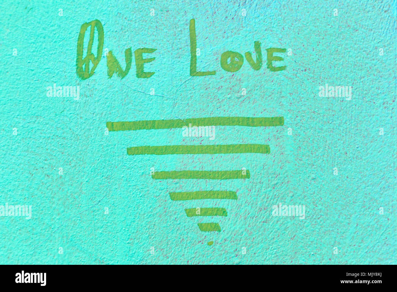 in cyprus the painted wall and the words one love likeconcept of ...