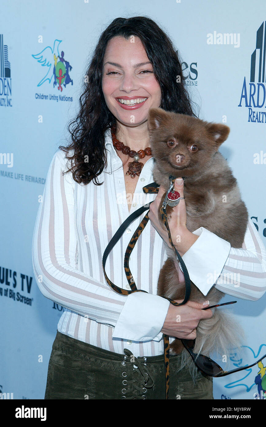 Fran Drescher and her dog Esther arriving at the 2002 International Day ...