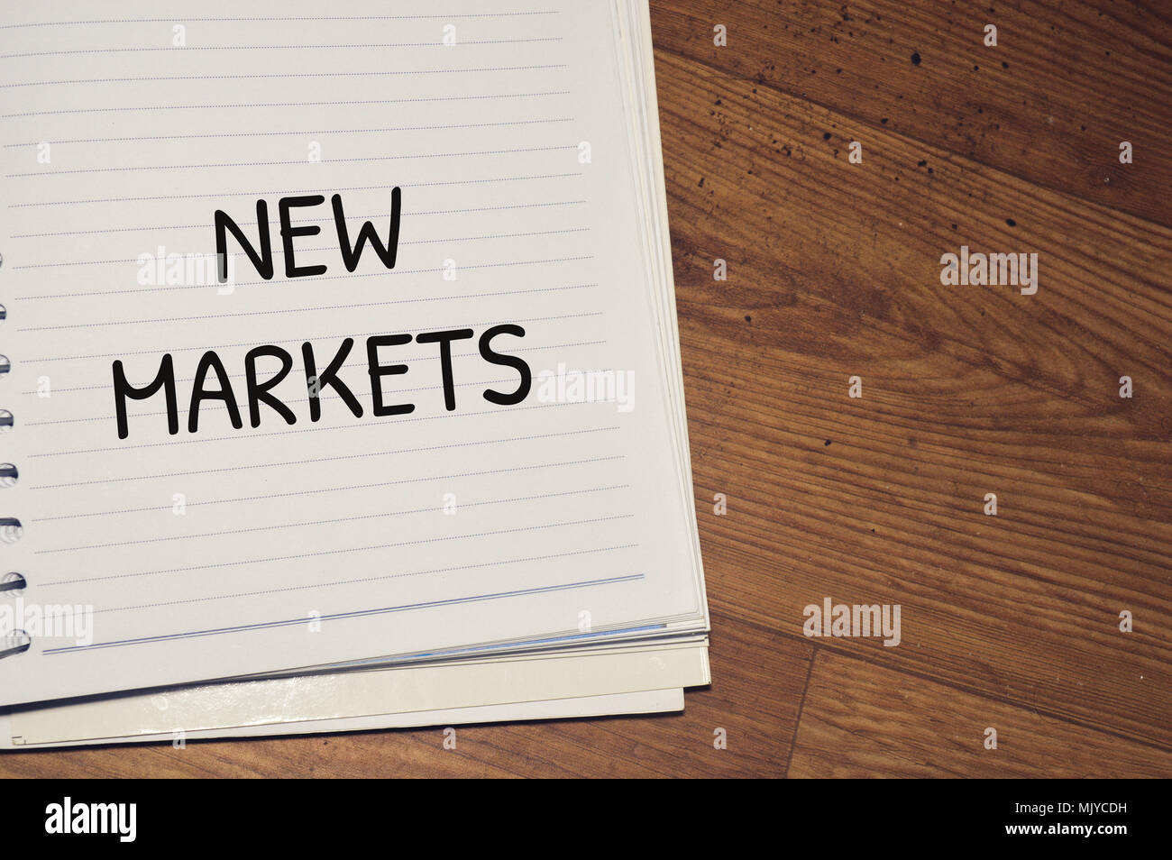 New markets word written on white paper Stock Photo - Alamy