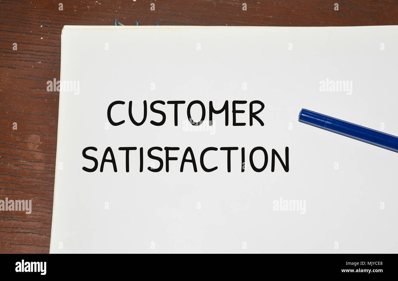 Customer satisfaction word written on white paper Stock Photo - Alamy
