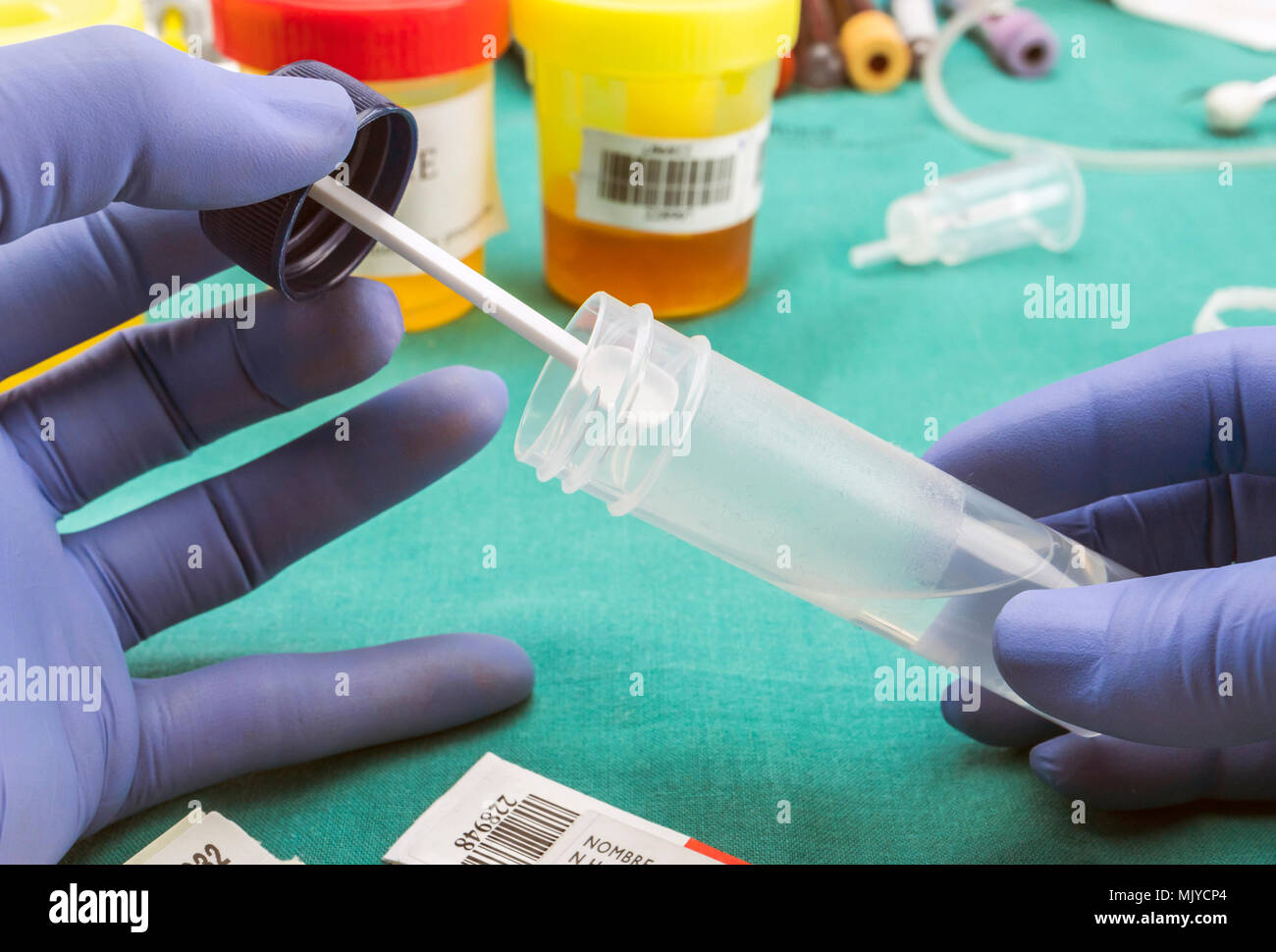 Scientist takes samples in a laboratory, conceptual image Stock Photo ...