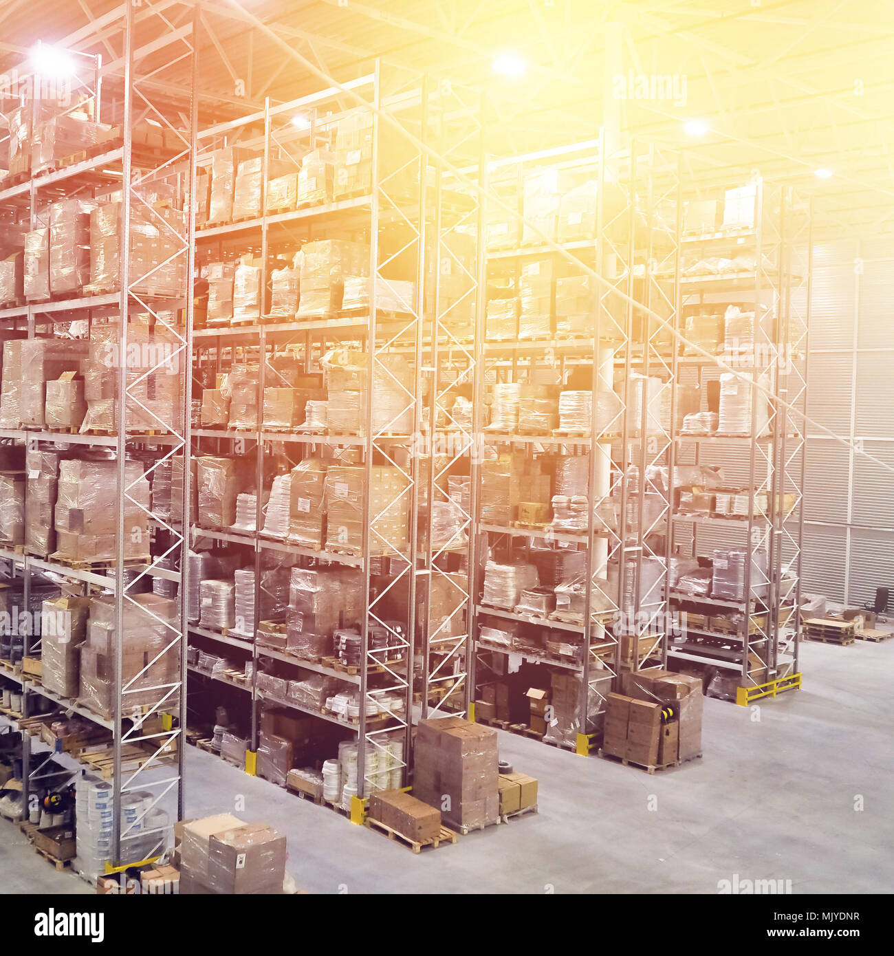 Large modern blurred warehouse industrial and logistics companies ...