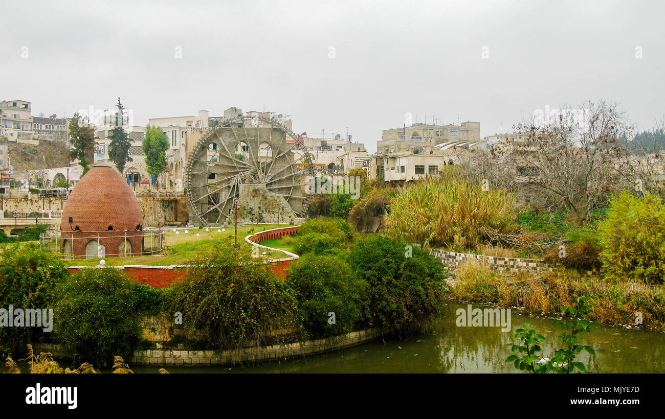 Hama syria noria waterwheel hi-res stock photography and images - Alamy