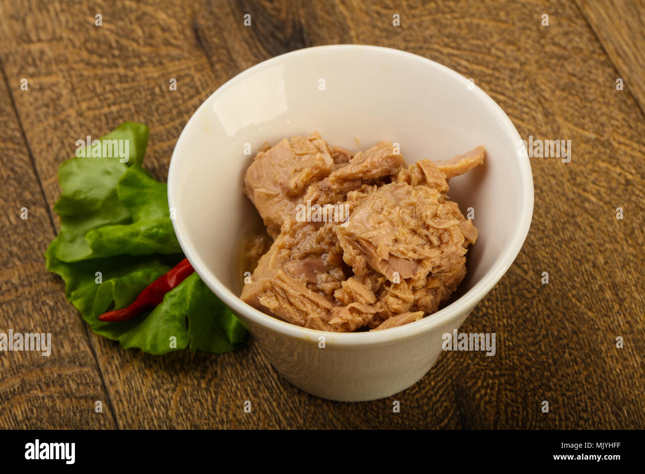 Canned tuna fish in the bowl ready for cooking Stock Photo - Alamy