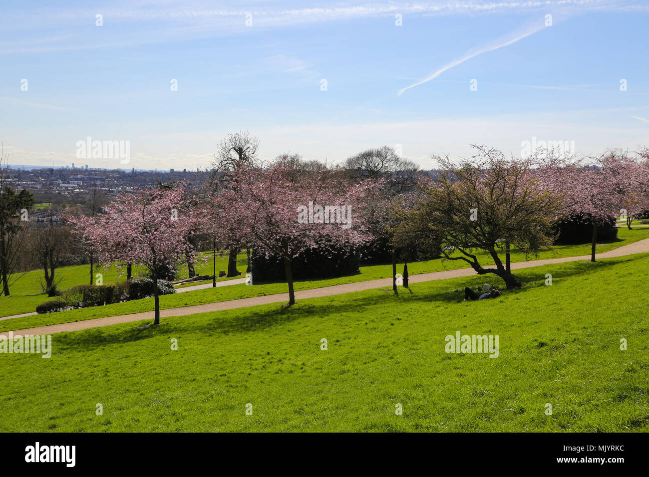 People enjoy warm spring sunshine in Alexandra Palace, north London ...
