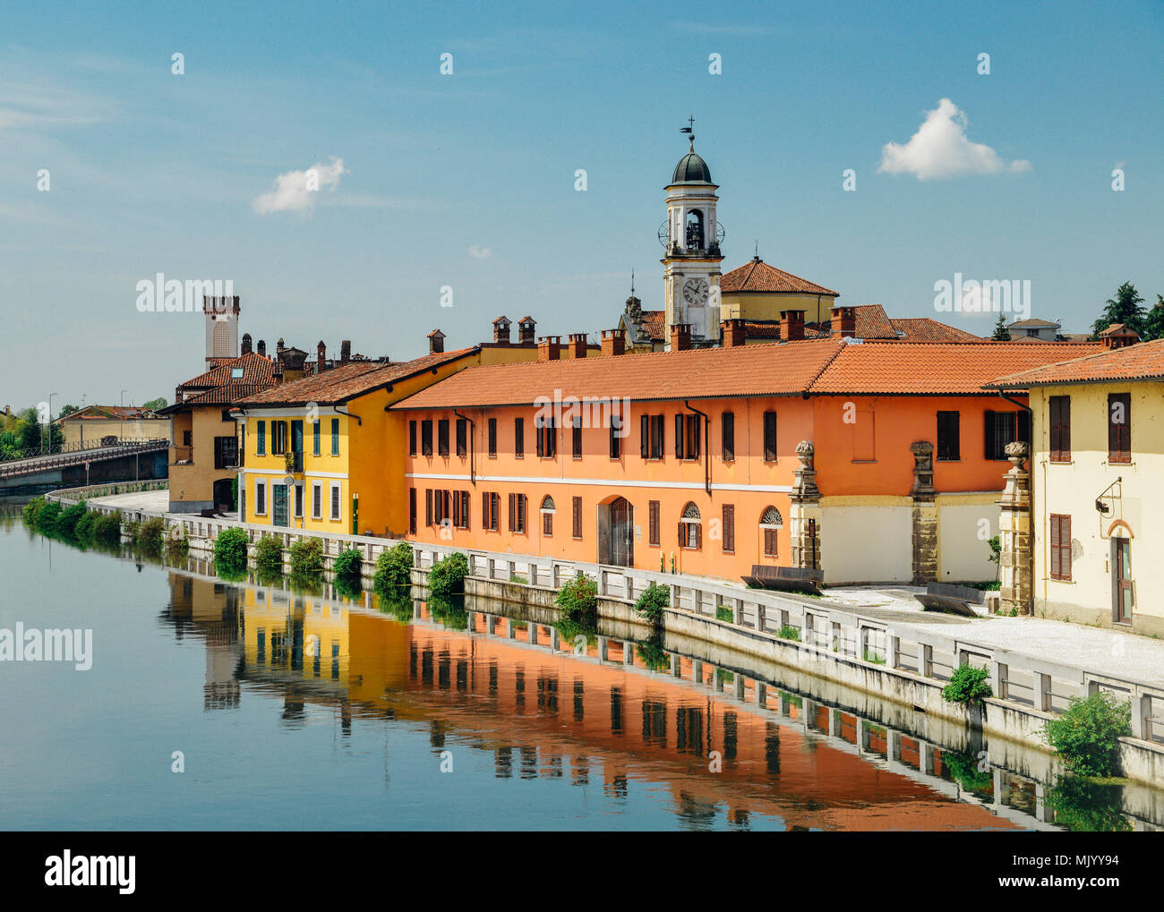 Cityscape of Gaggiano, just outside of Milan. Colourful houses ...