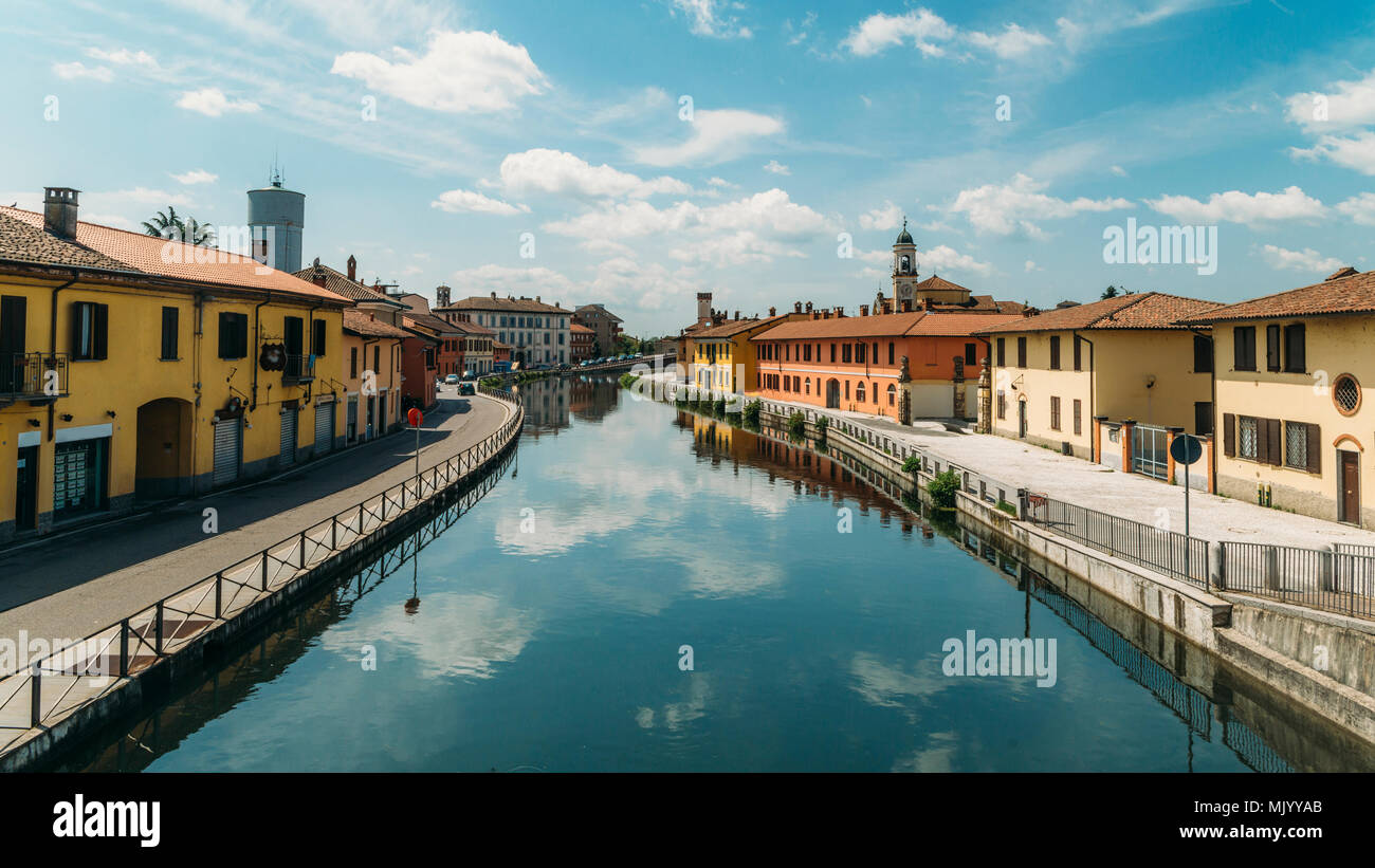 Cityscape of Gaggiano, just outside of Milan. Colourful houses ...