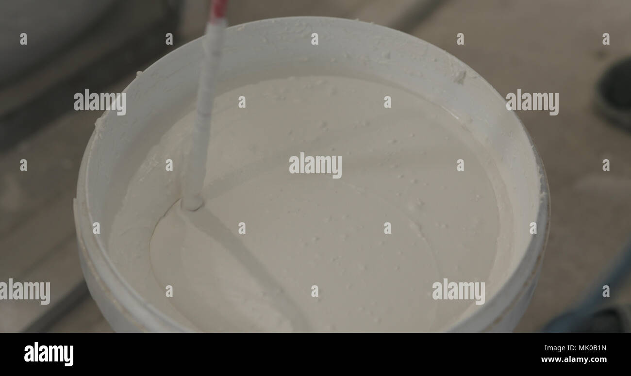 Cement in bucket hi-res stock photography and images - Alamy