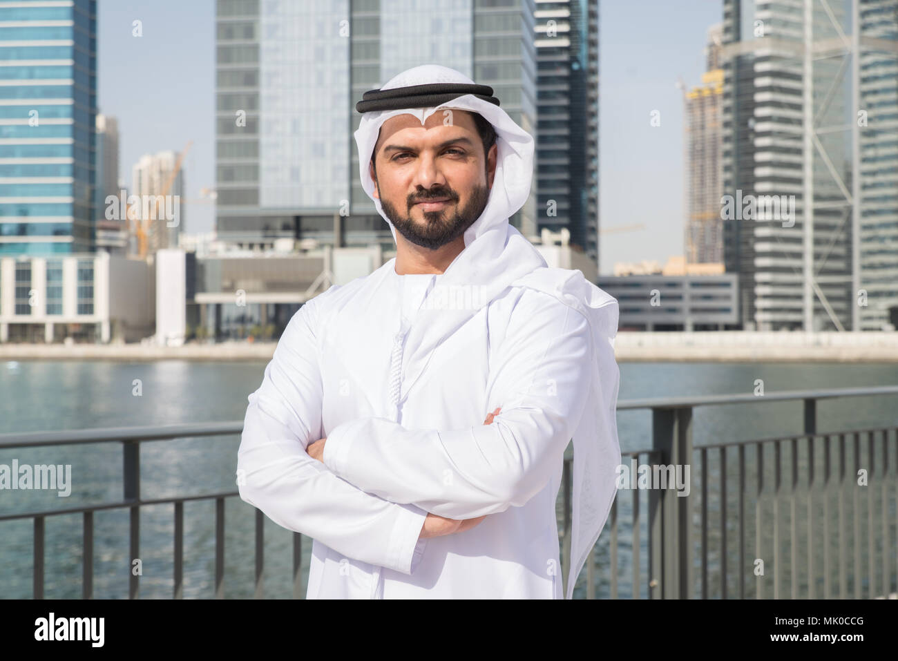 Arabic businessman wearing kandora - Portrait of traditional emirati ...