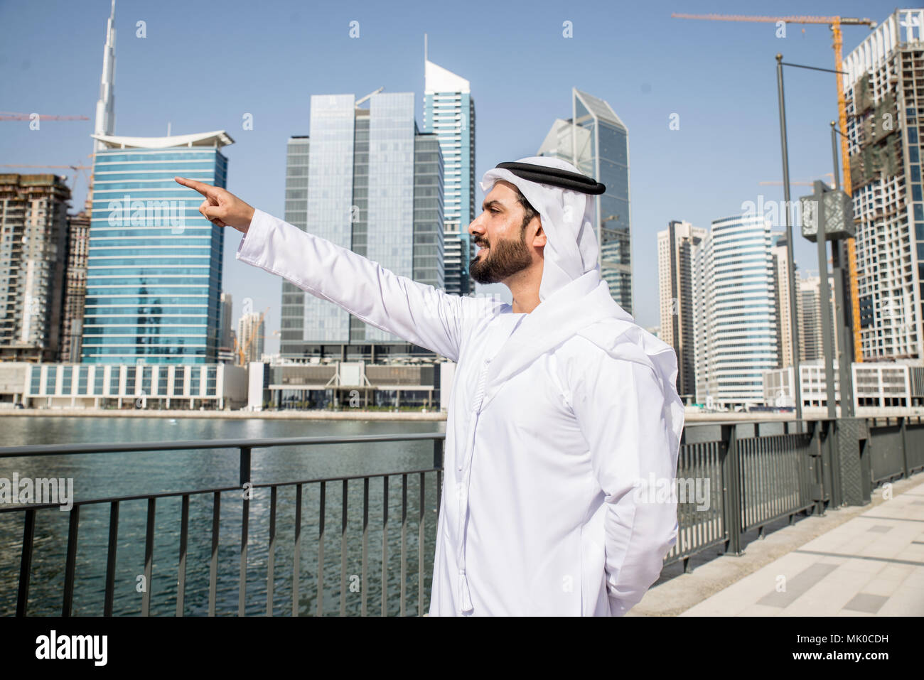 Arabic businessman wearing kandora - Portrait of traditional emirati ...