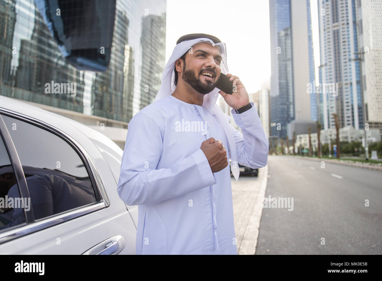Ararabic businessman wearing kandora - Portrait of traditional emirati ...