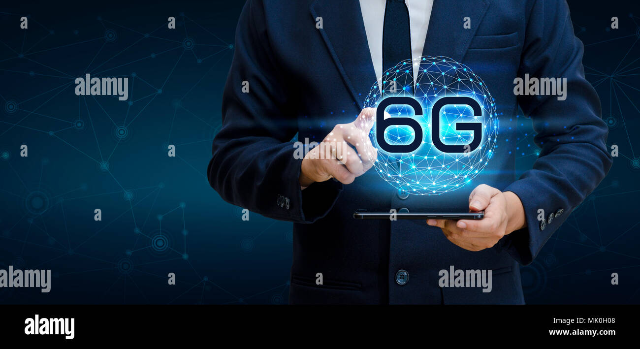 phone 6g Earth businessman connect worldwide waiter hand holding an ...