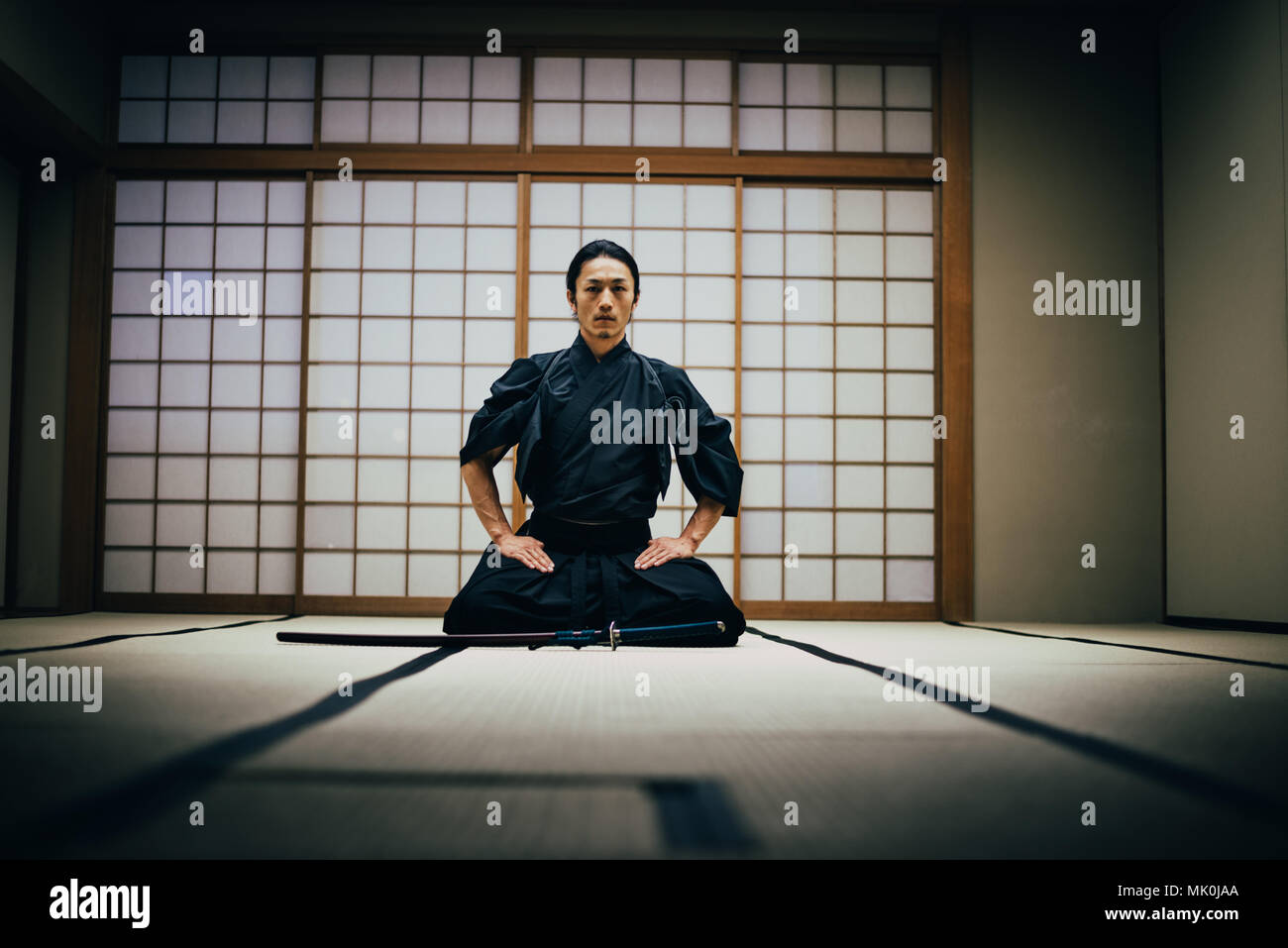 Japanese martial arts athlete training kendo in a dojo - Samaurai ...