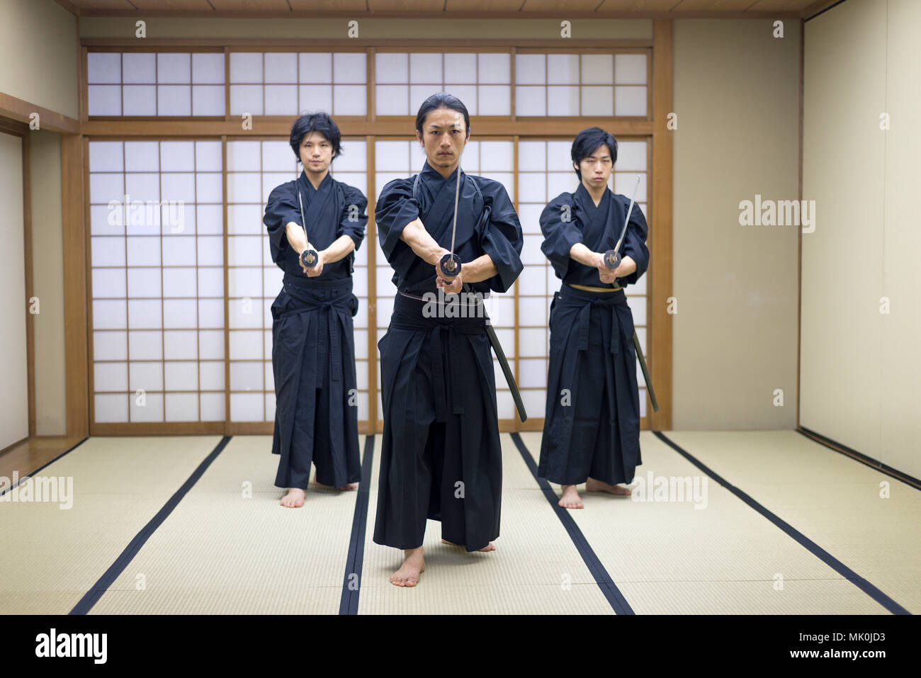 Japanese martial arts athlete training kendo in a dojo - Samaurai ...