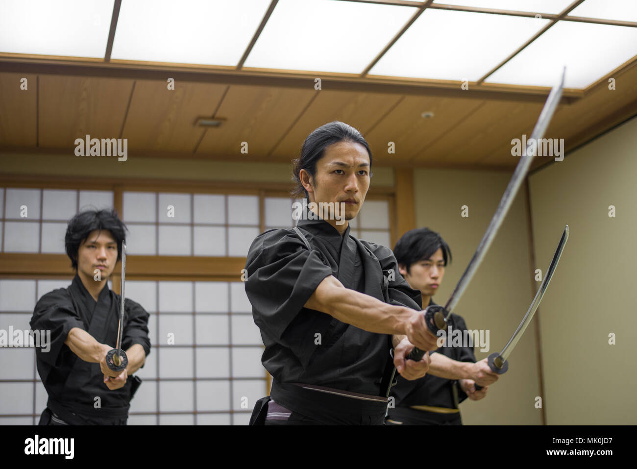 Japanese martial arts athlete training kendo in a dojo - Samaurai ...