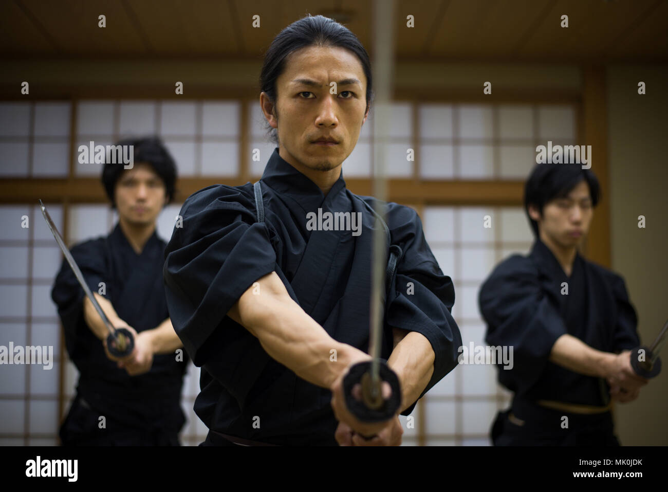 Japanese martial arts athlete training kendo in a dojo - Samaurai ...