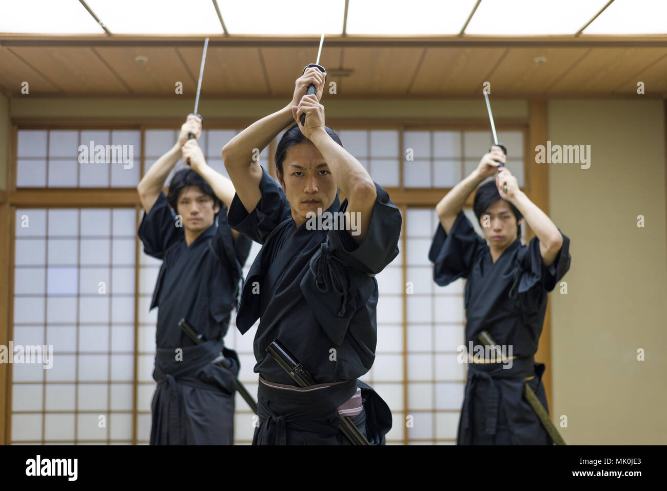 Japanese martial arts athlete training kendo in a dojo - Samaurai ...