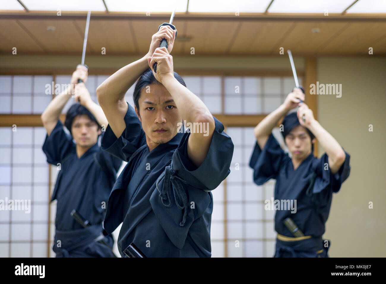 Japanese martial arts athlete training kendo in a dojo - Samaurai ...