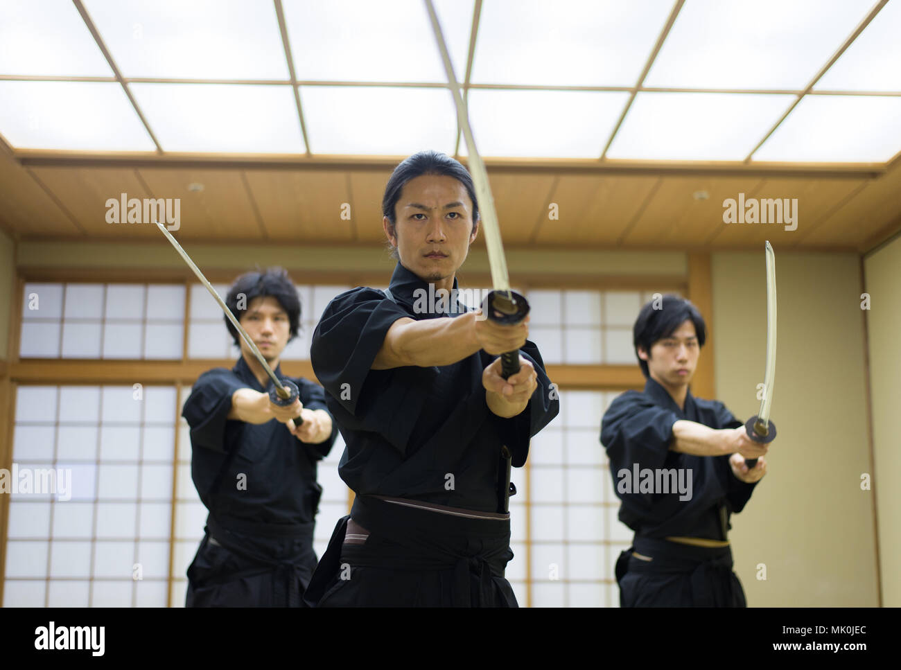 Japanese martial arts athlete training kendo in a dojo - Samaurai ...