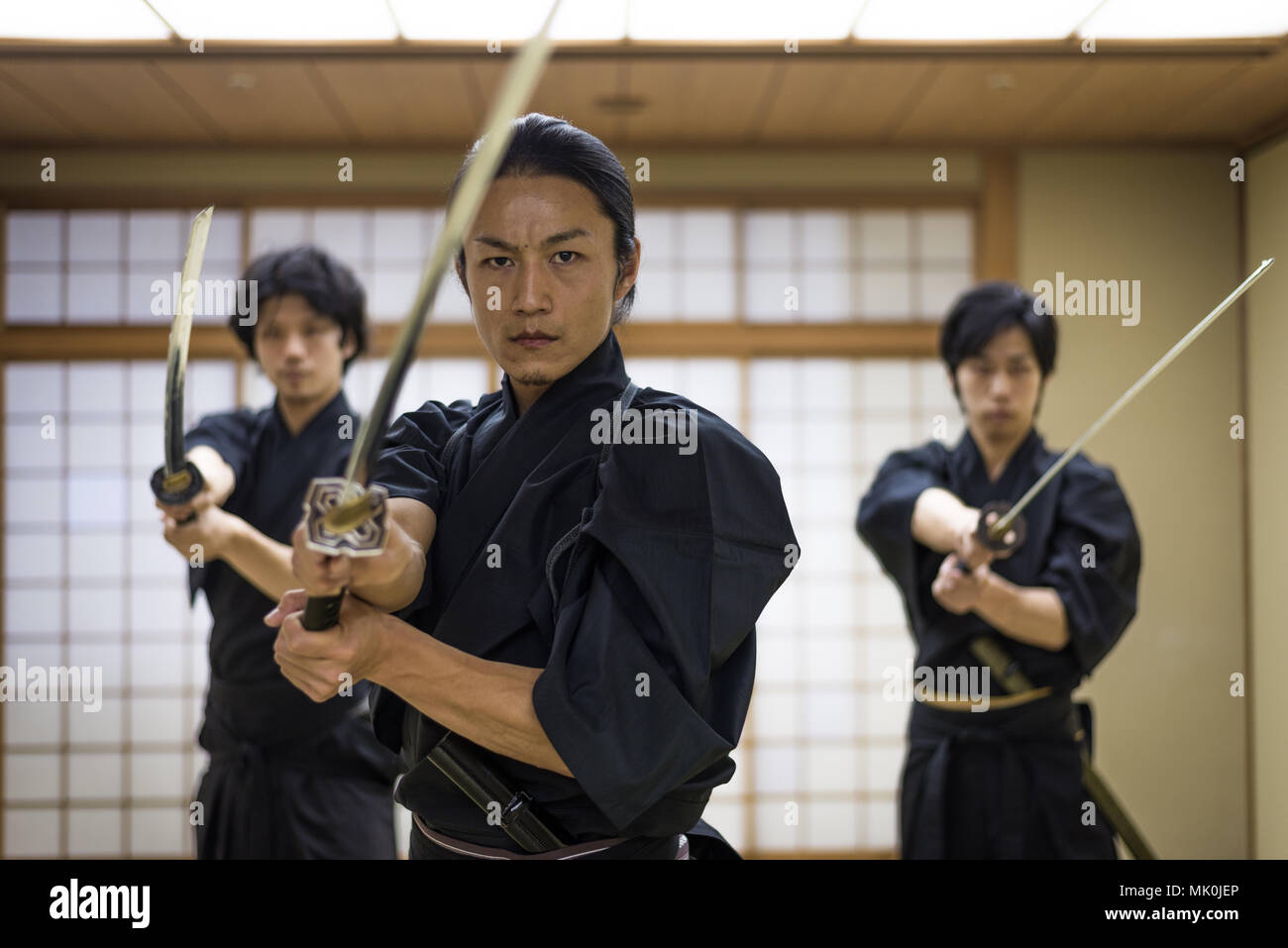 Japanese martial arts athlete training kendo in a dojo - Samaurai ...