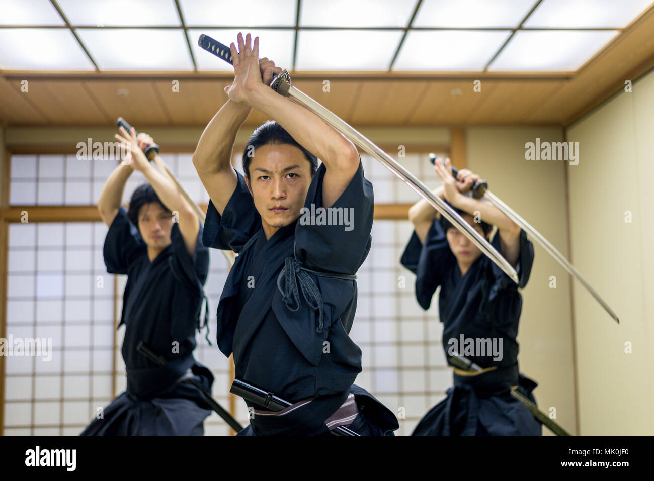 Japanese martial arts athlete training kendo in a dojo - Samaurai ...