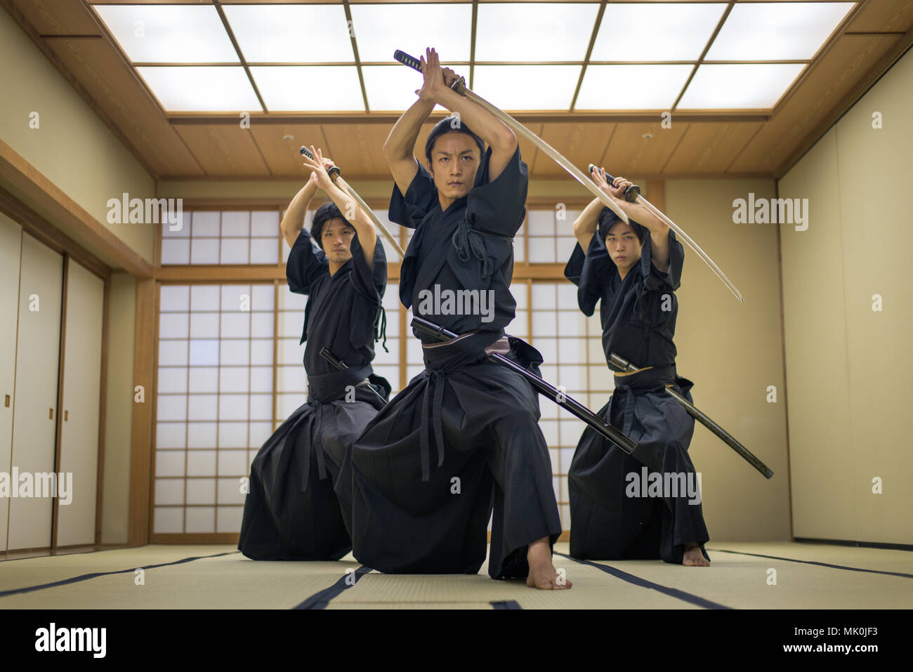Japanese martial arts athlete training kendo in a dojo - Samaurai ...