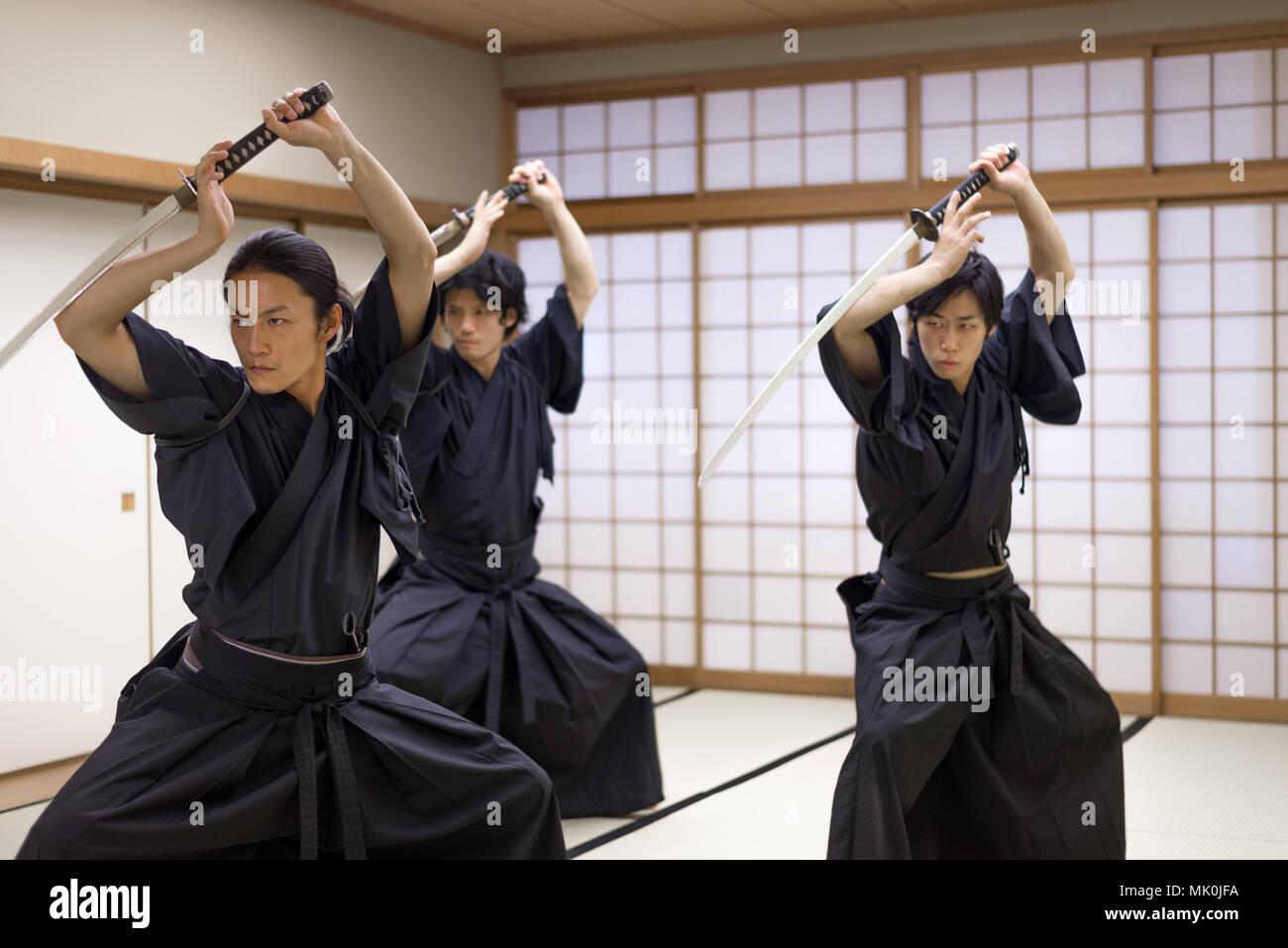 Japanese martial arts athlete training kendo in a dojo - Samaurai ...
