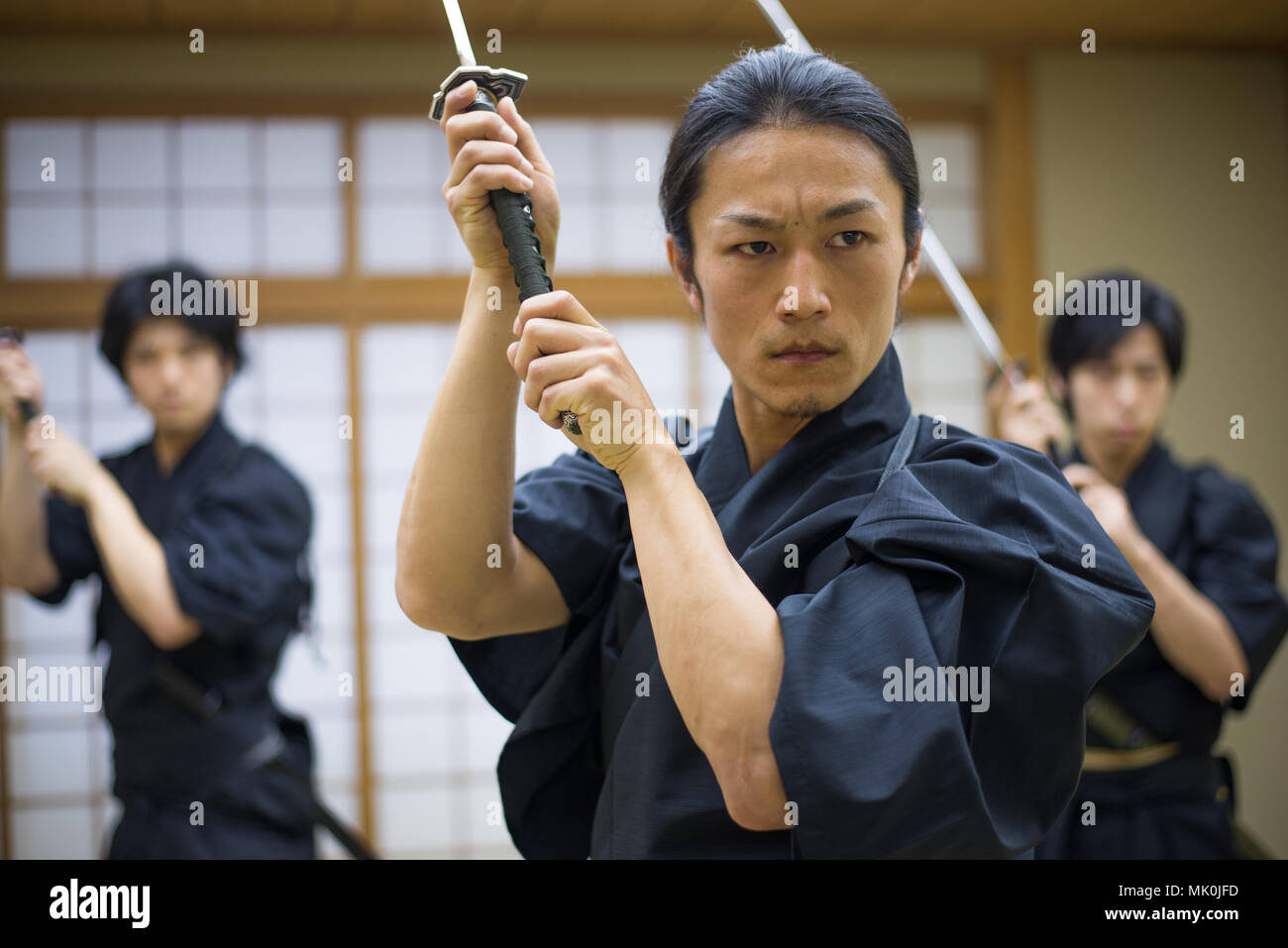 Japanese martial arts athlete training kendo in a dojo - Samaurai ...