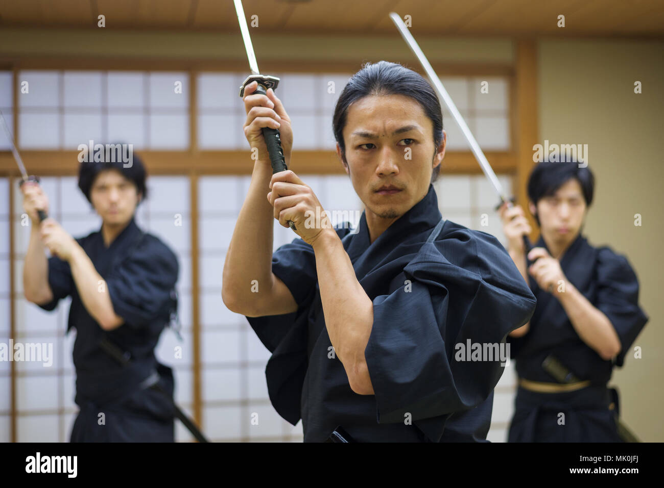Japanese martial arts athlete training kendo in a dojo - Samaurai ...