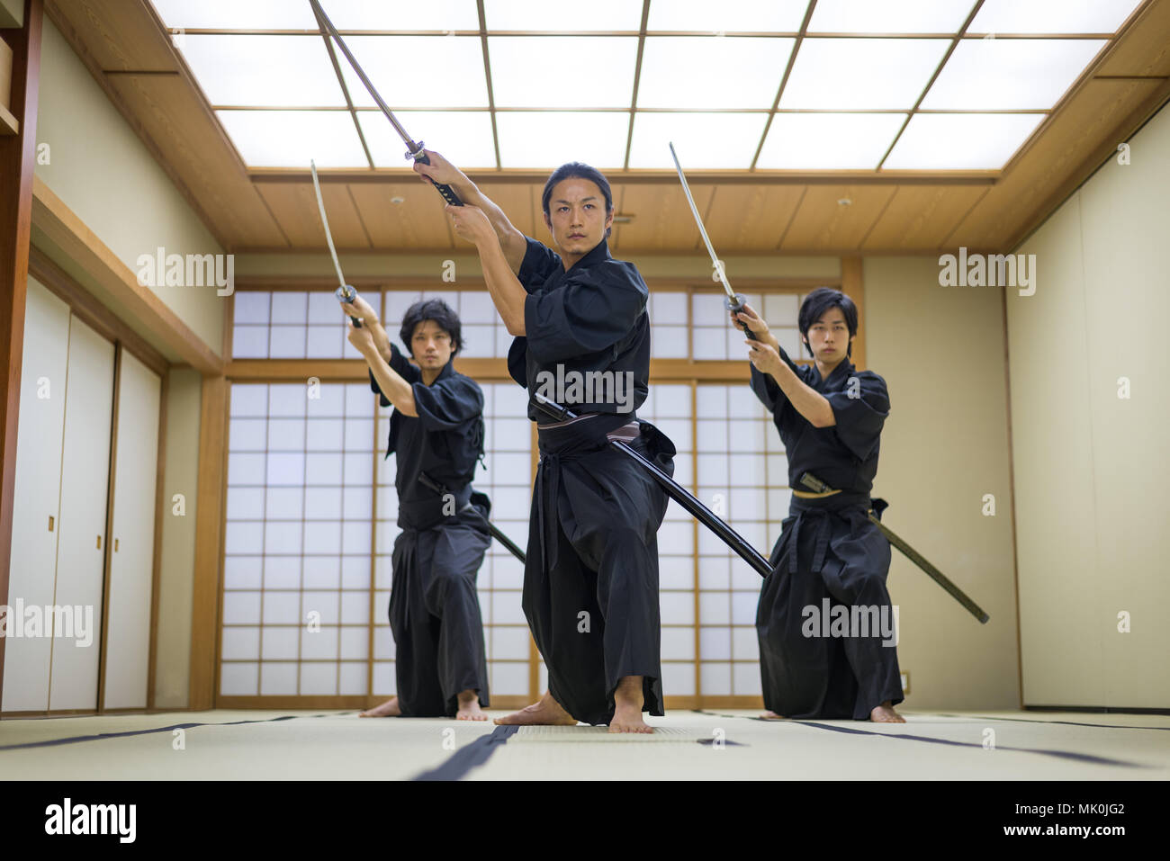 Japanese martial arts athlete training kendo in a dojo - Samaurai ...