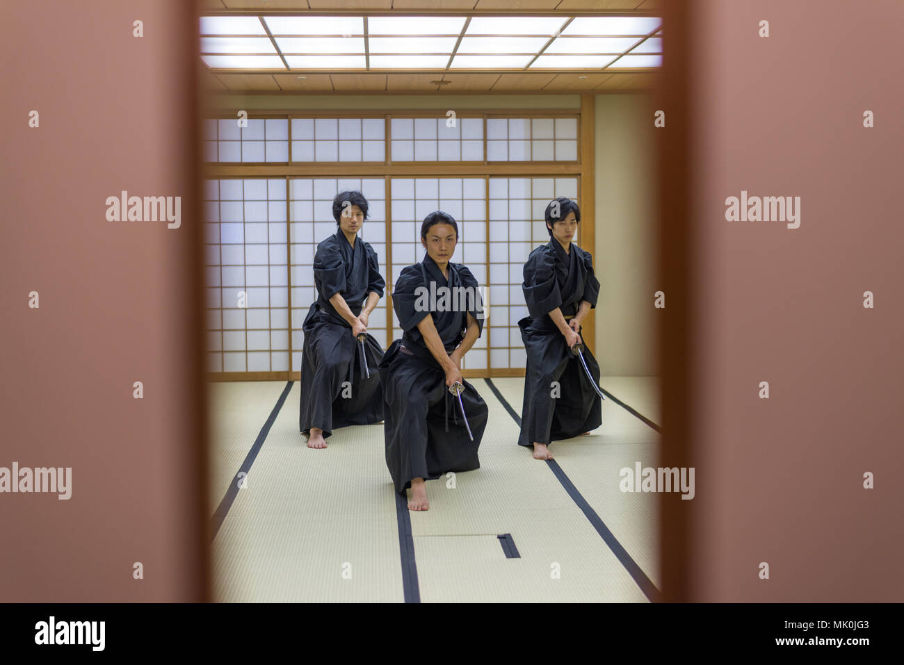 Japanese martial arts athlete training kendo in a dojo - Samaurai ...