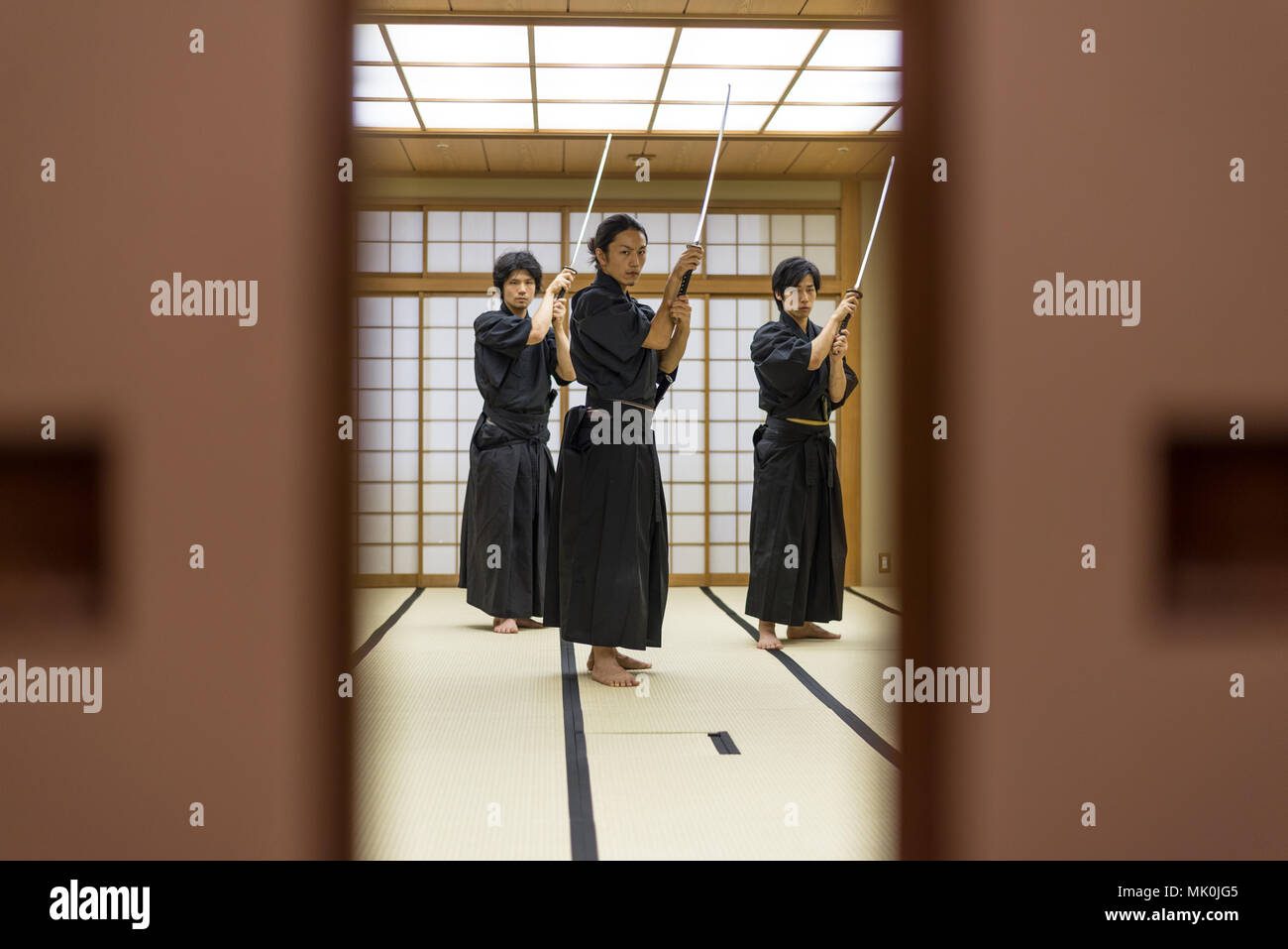 Japanese martial arts athlete training kendo in a dojo - Samaurai ...