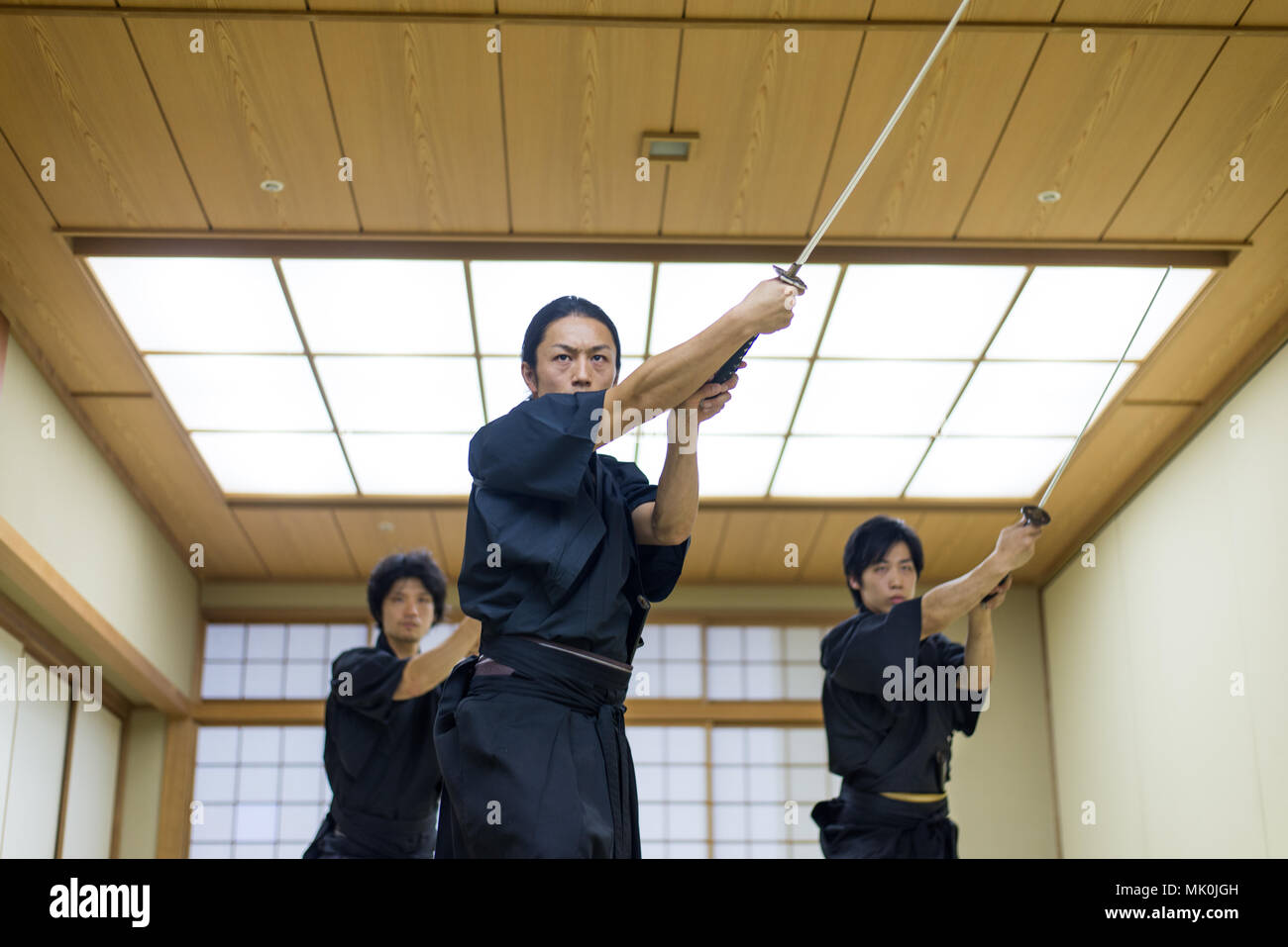 Japanese martial arts athlete training kendo in a dojo - Samaurai ...