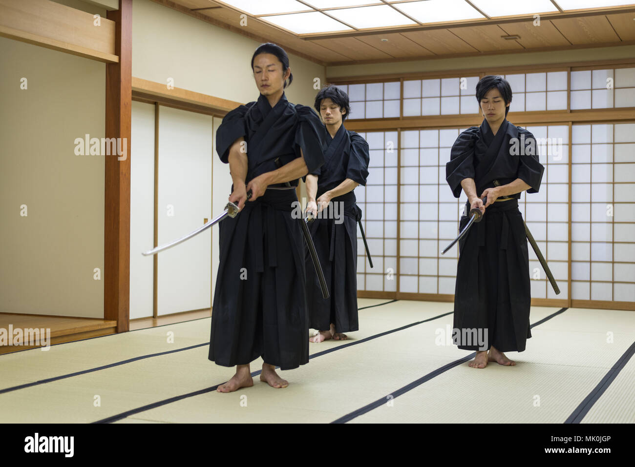 Japanese martial arts athlete training kendo in a dojo - Samaurai ...