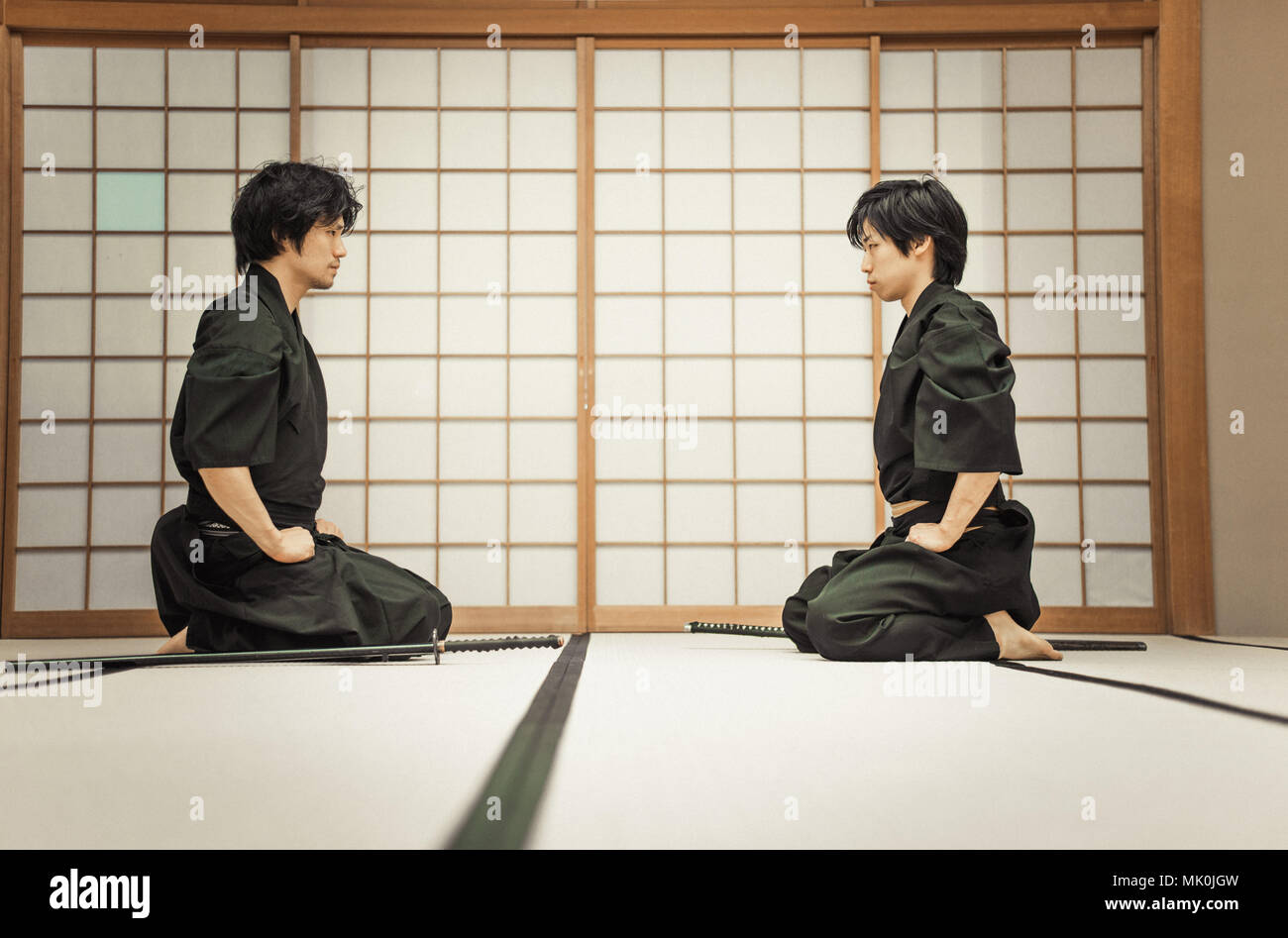 Japanese martial arts athlete training kendo in a dojo - Samaurai ...