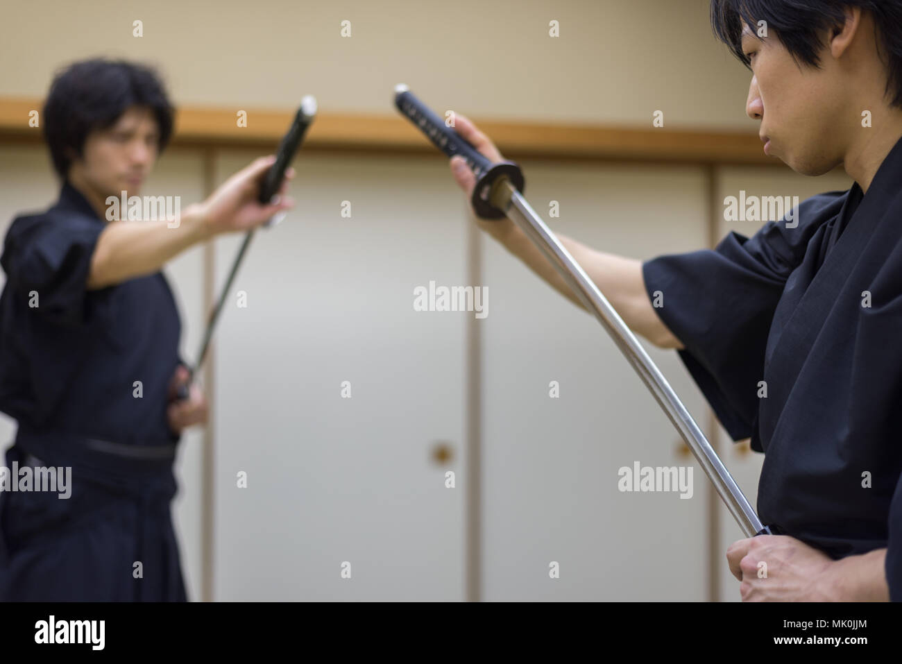 Japanese martial arts athlete training kendo in a dojo - Samaurai ...