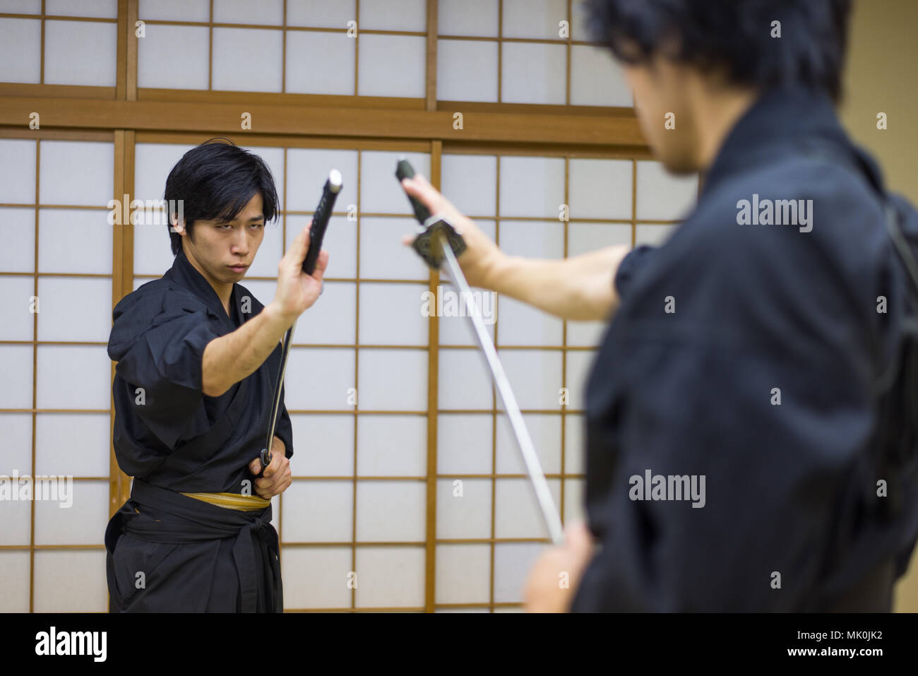 Japanese martial arts athlete training kendo in a dojo - Samaurai ...