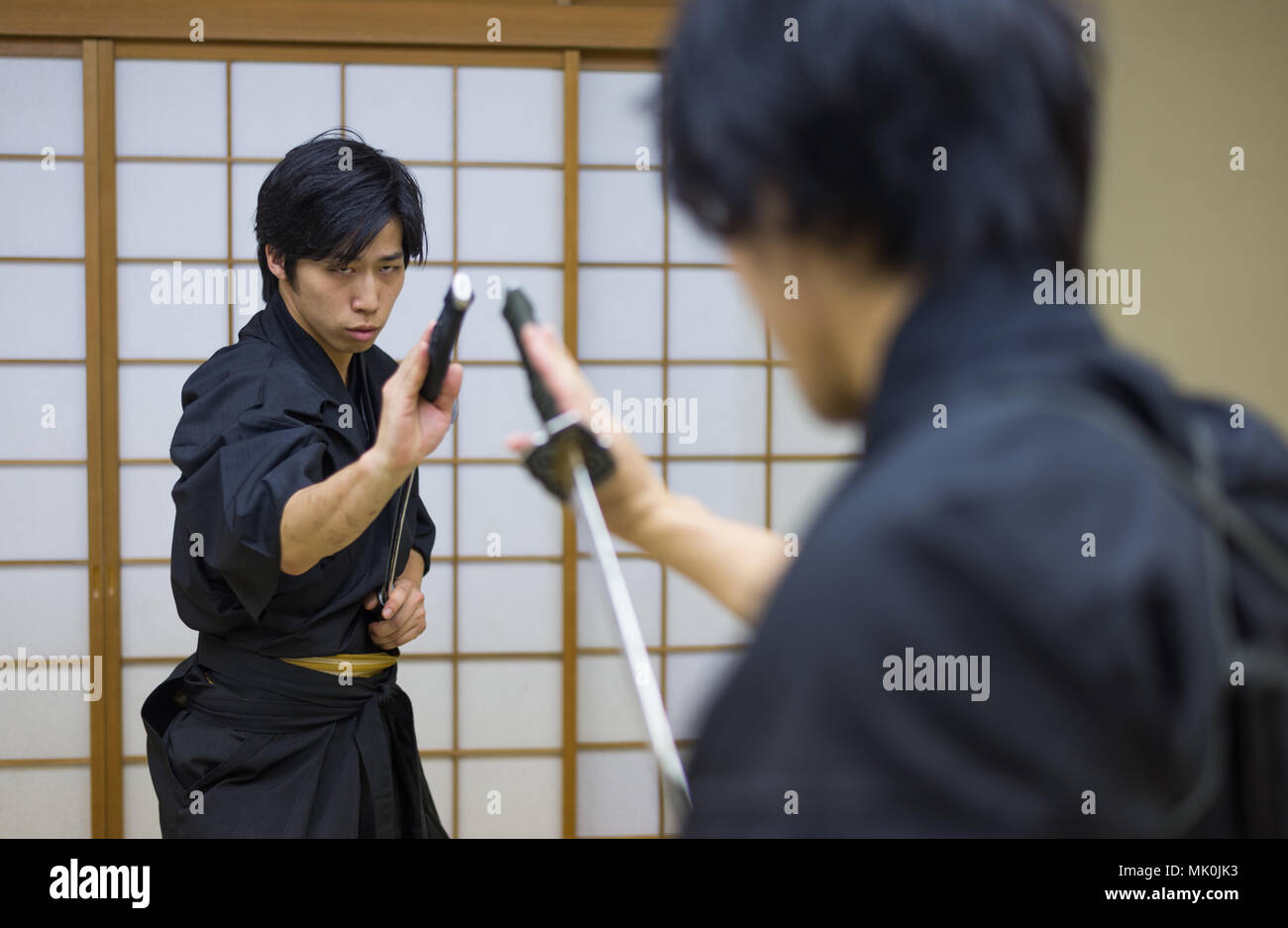 Japanese martial arts athlete training kendo in a dojo - Samaurai ...