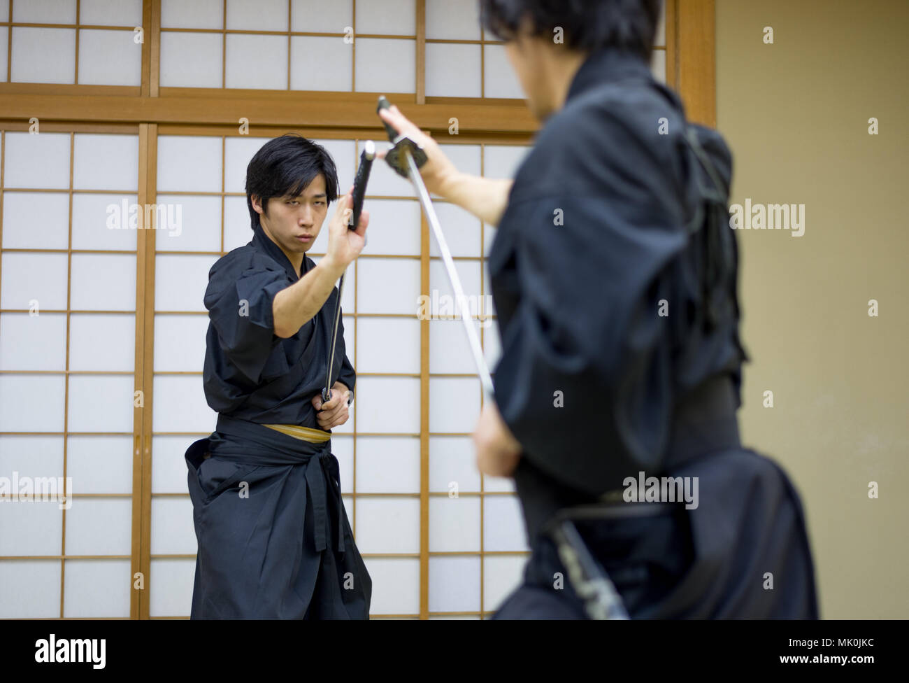 Japanese martial arts athlete training kendo in a dojo - Samaurai ...