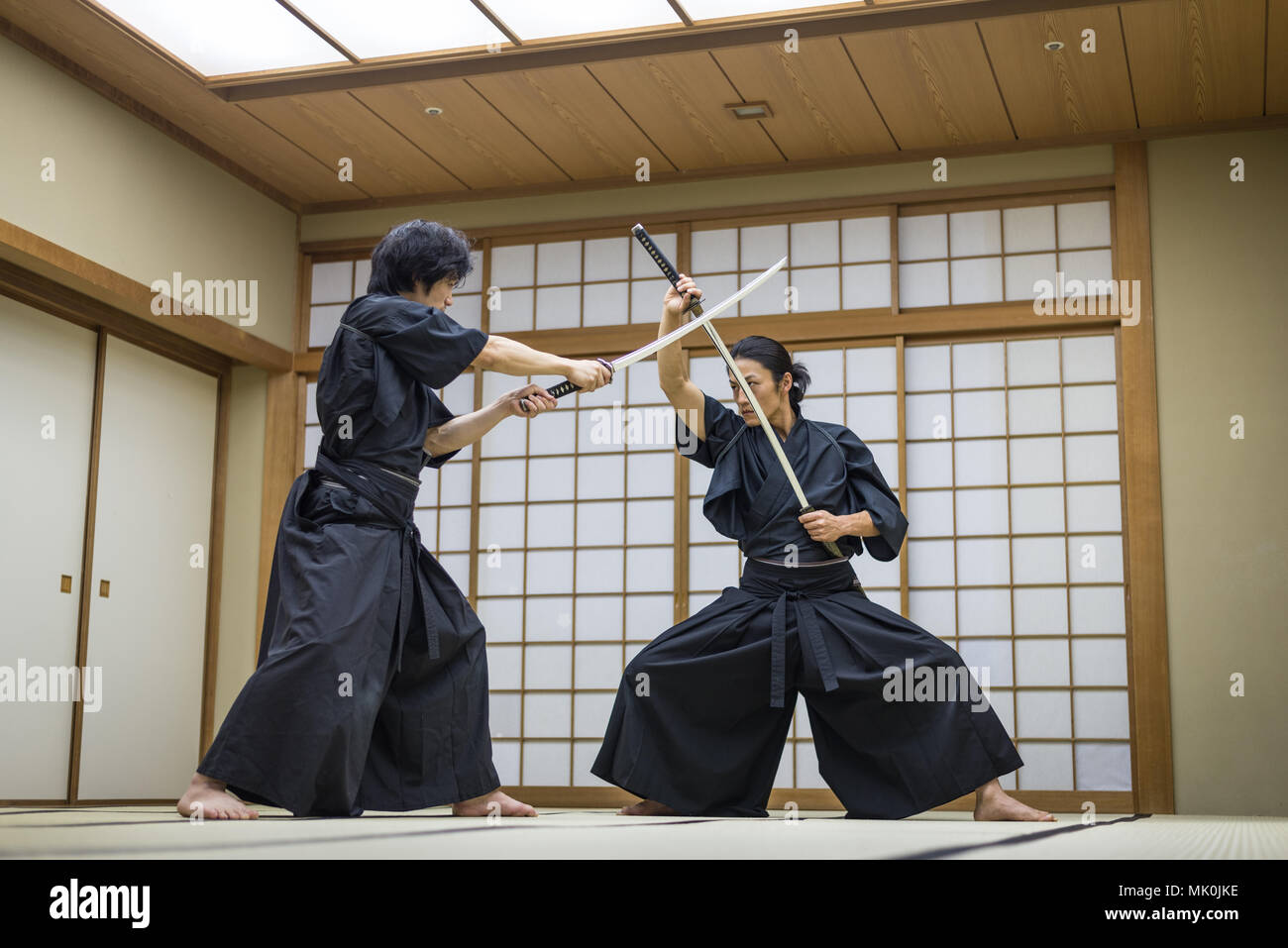 Japanese martial arts athlete training kendo in a dojo - Samaurai ...