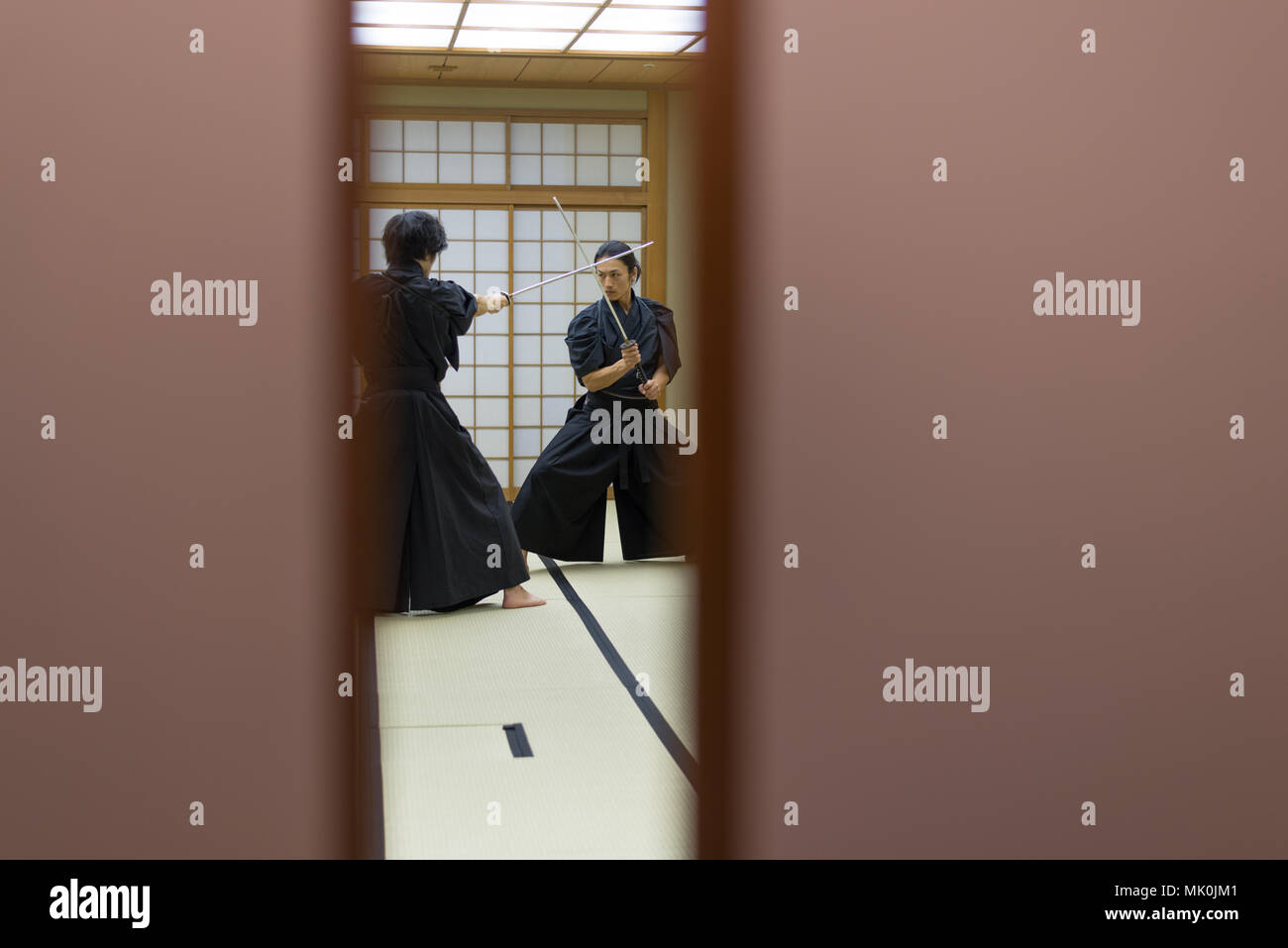 Japanese martial arts athlete training kendo in a dojo - Samaurai ...